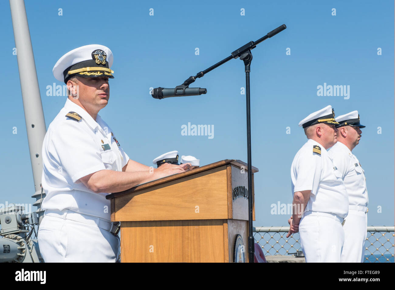 Cmdr. Tadd Gorman, commanding officer of the USS *Ross* (DDG 71), leads ...