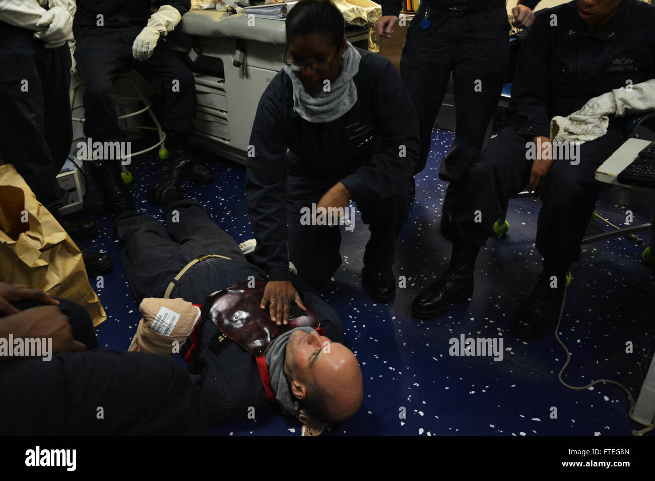 Hospital Corpsman 3rd Class Carline Charles demonstrates first aid ...
