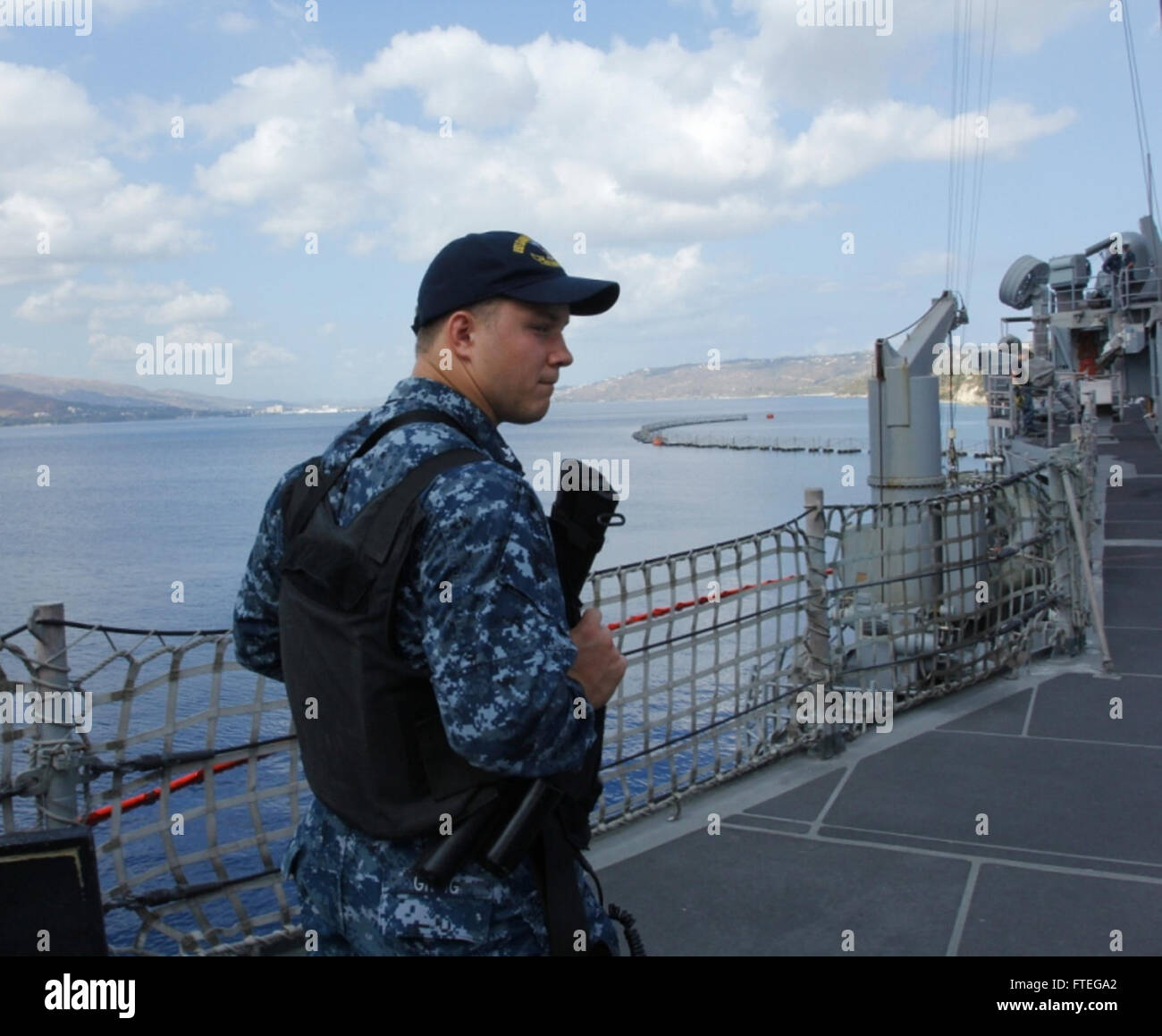 Sonar Technician 2nd Class Brett Greig stands a roving watch aboard the ...