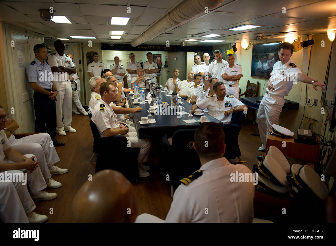 This U.S. Navy photo shows Lieutenant Michael Maxwell explaining the ...