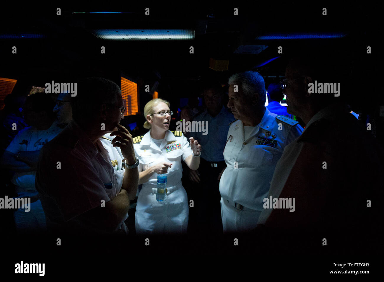 Commander Camille Flaherty of USS Arleigh Burke (DDG 51) discusses the ...
