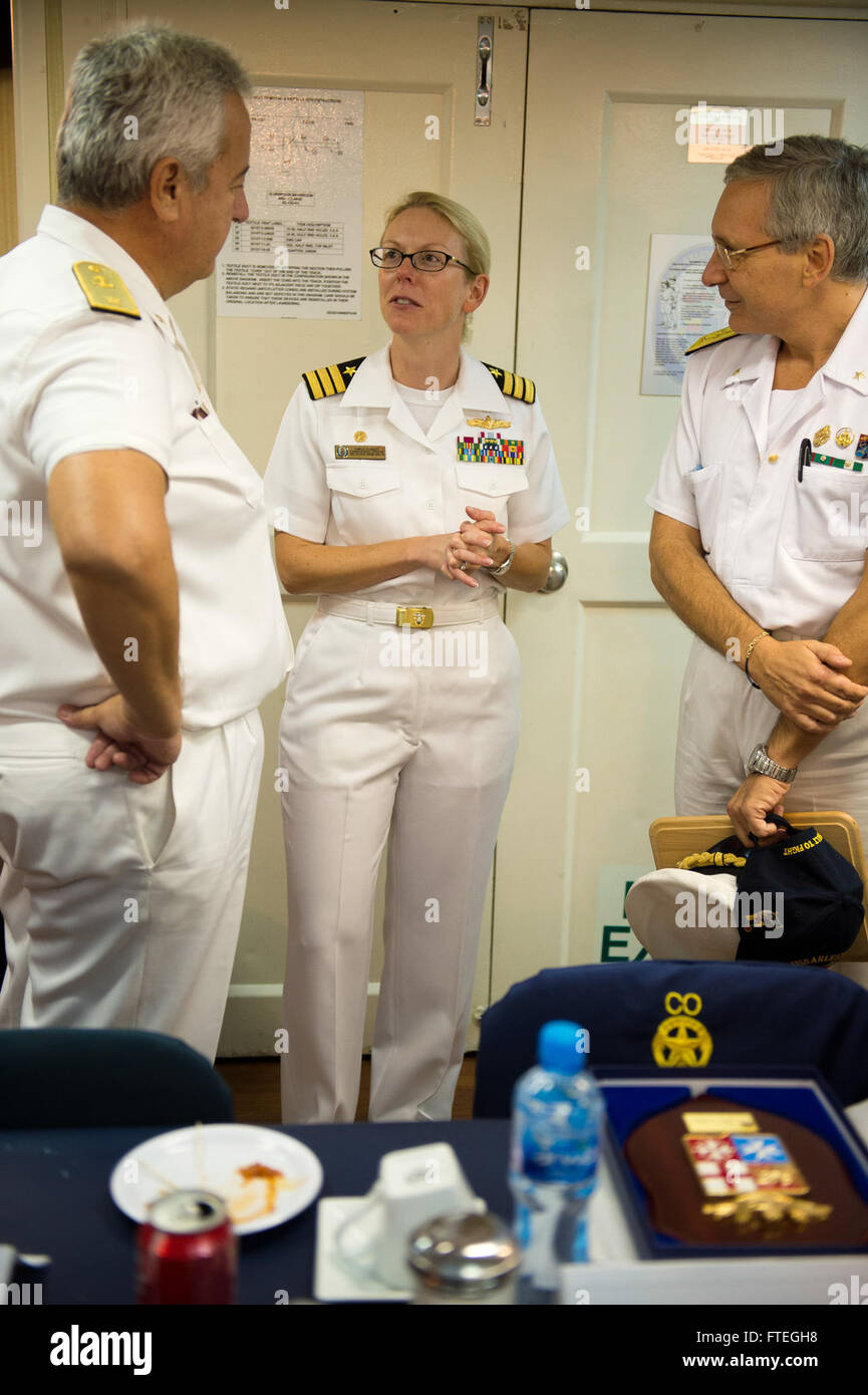 Commander Camille Flaherty of USS Arleigh Burke (DDG 51) speaks with ...