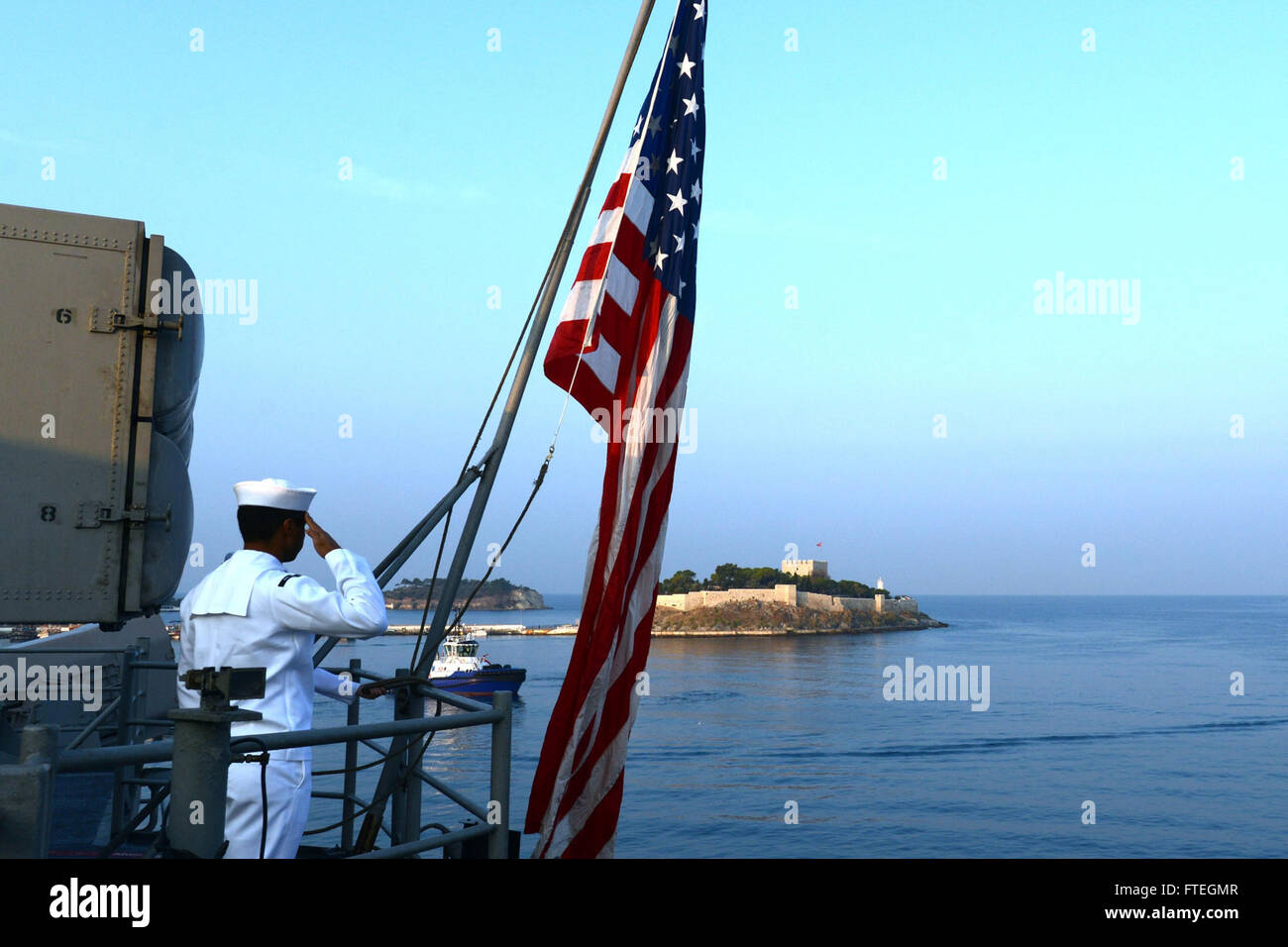 Hospital Corpsman 3rd Class Jerry Winfrey salutes while Hospitalman ...