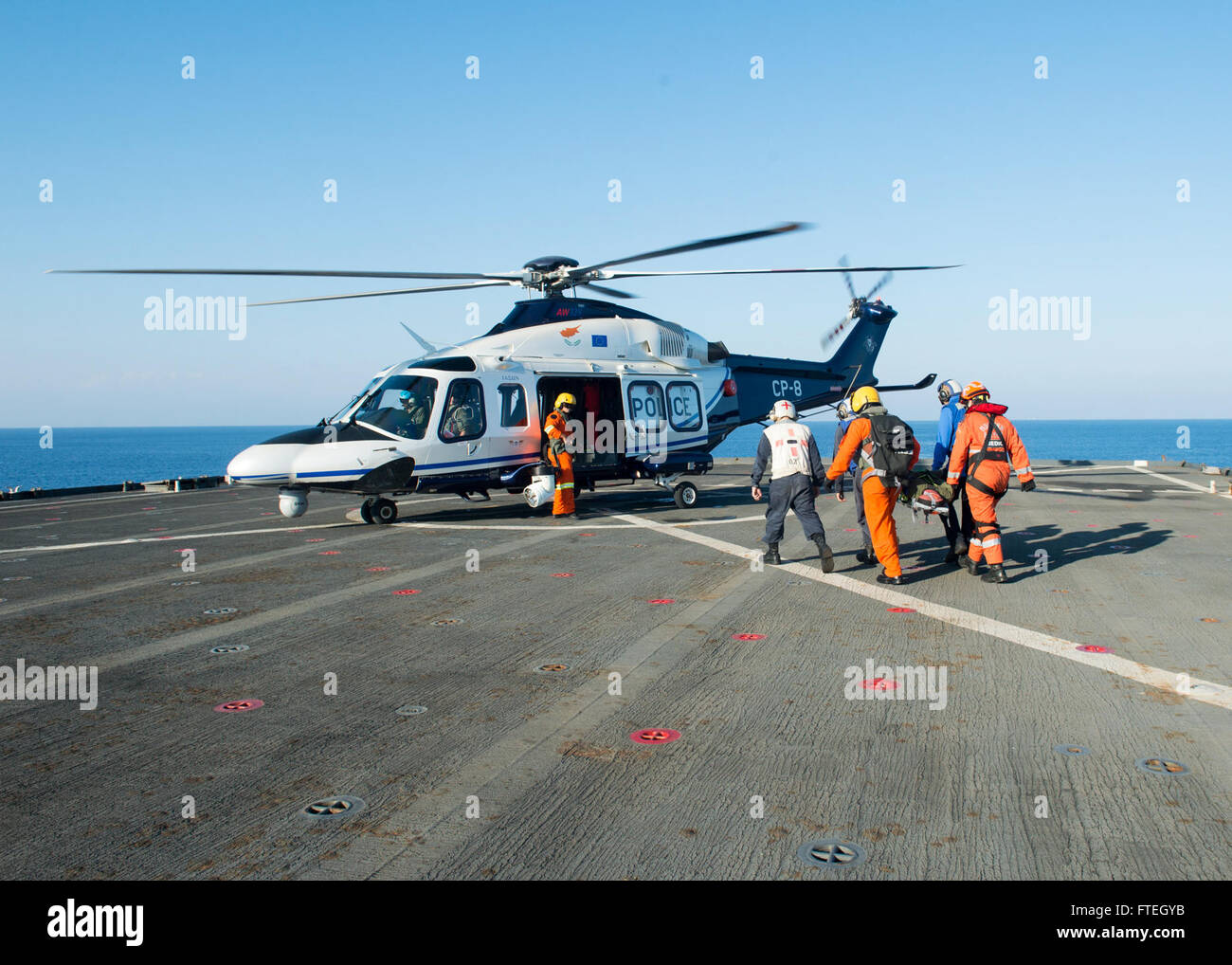 MEDITERRANEAN SEA (Oct. 7, 2014) Sailors carry a simulated casualty to ...