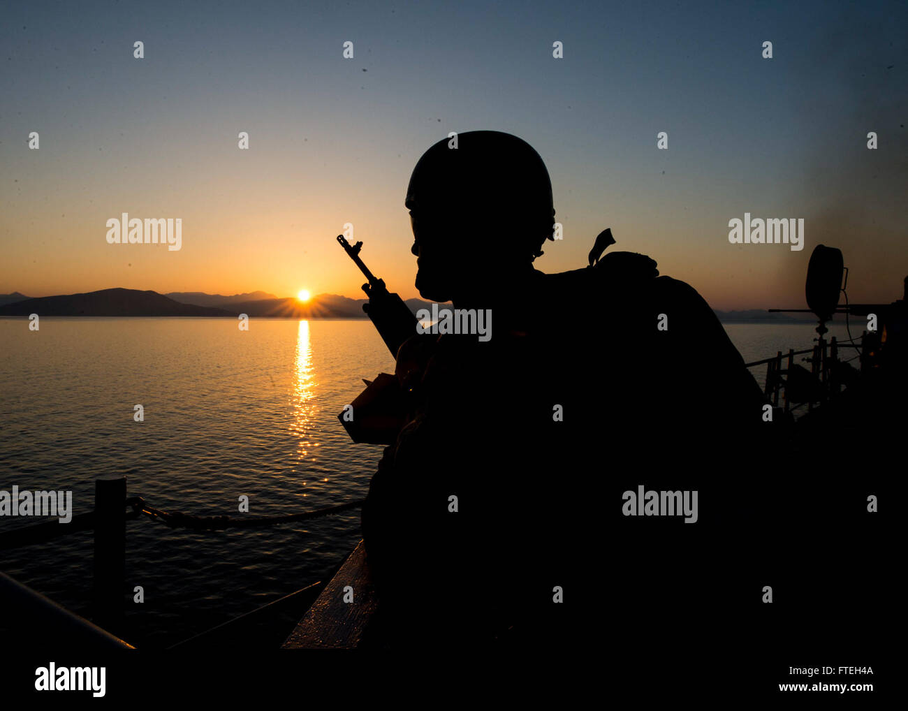 This photograph shows Gunner's Mate 2nd Class William Carpenter ...