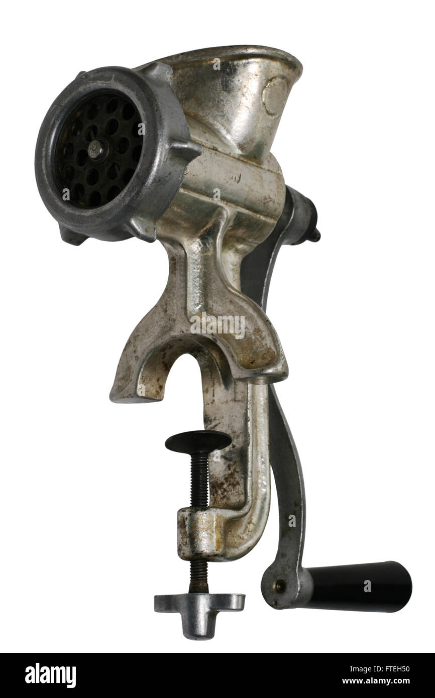 Old meat grinder on a white background Stock Photo - Alamy