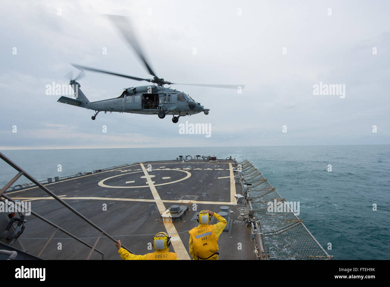 The USS Cole (DDG 67), an Arleigh Burke-class guided-missile destroyer ...
