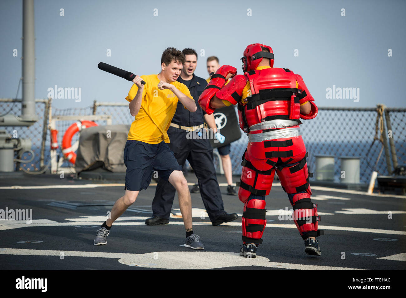 This image shows Sonar Technician 3rd Class Ryan Shields defending ...