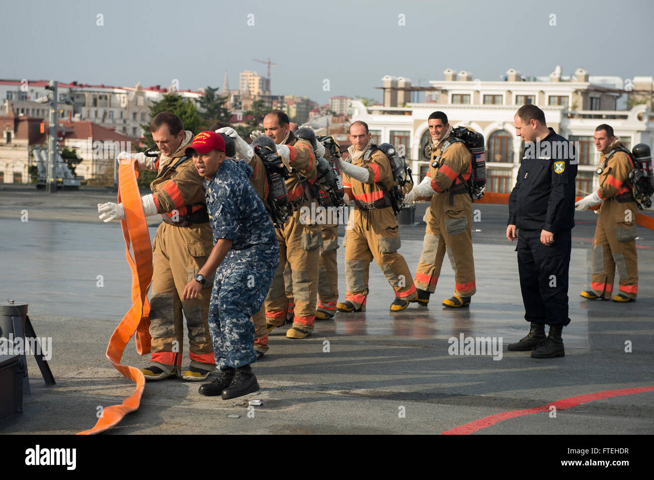 A photo of the Georgian Coast Guard participating in damage control ...