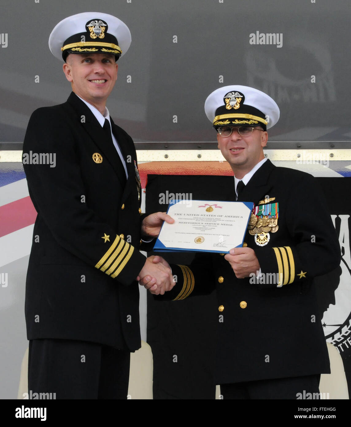 NAVAL STATION ROTA, Spain (October 17, 2014) – Capt. James Aiken, left ...