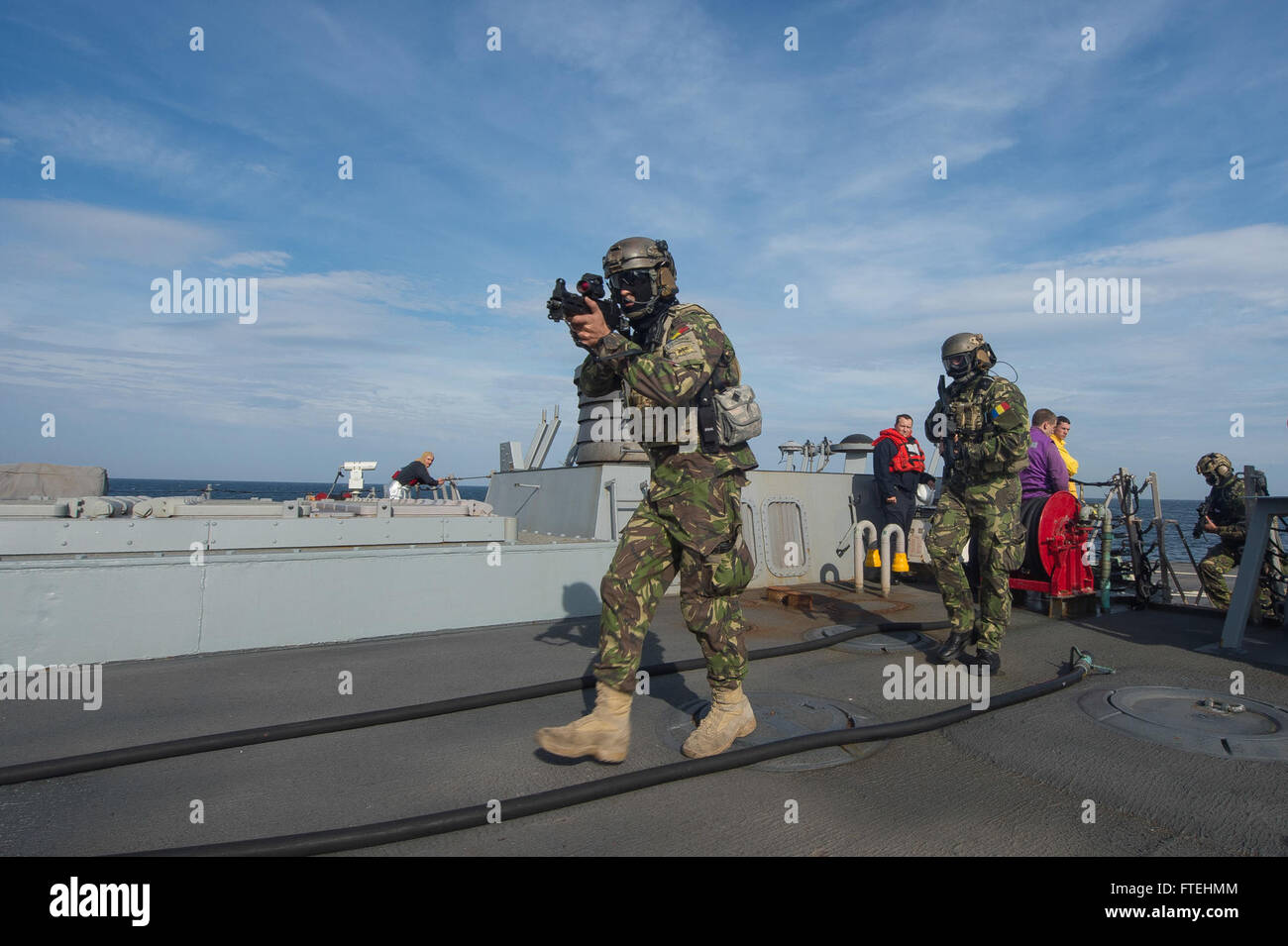 Romanian Navy special forces conduct a simulated exercise aboard the ...