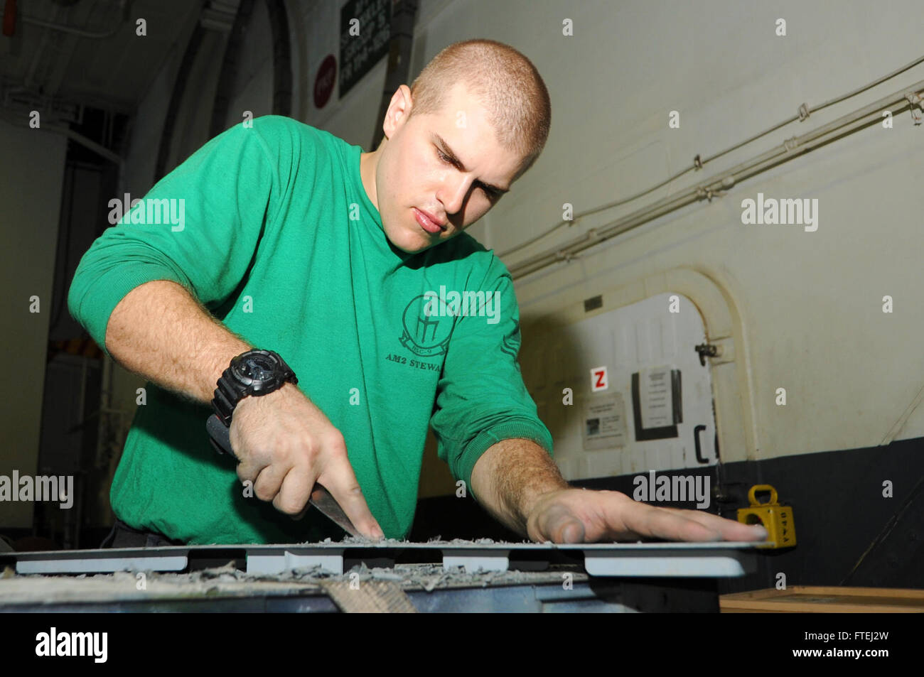 This photograph shows Aviation Structural Mechanic 2nd Class Roger ...