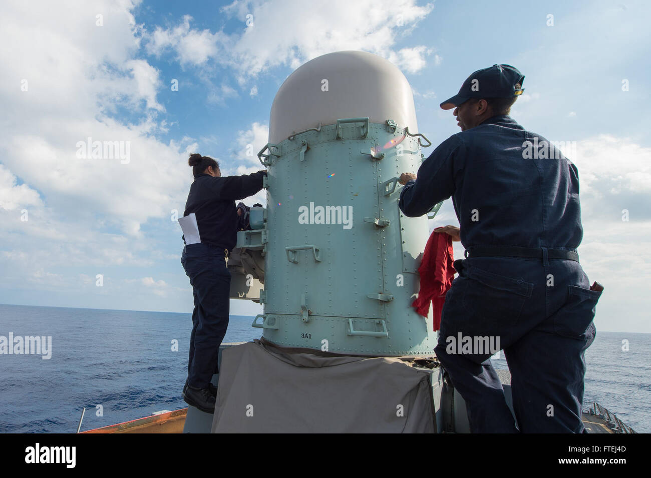 Sailors aboard the USS Cole, an Arleigh Burke-class guided-missile ...