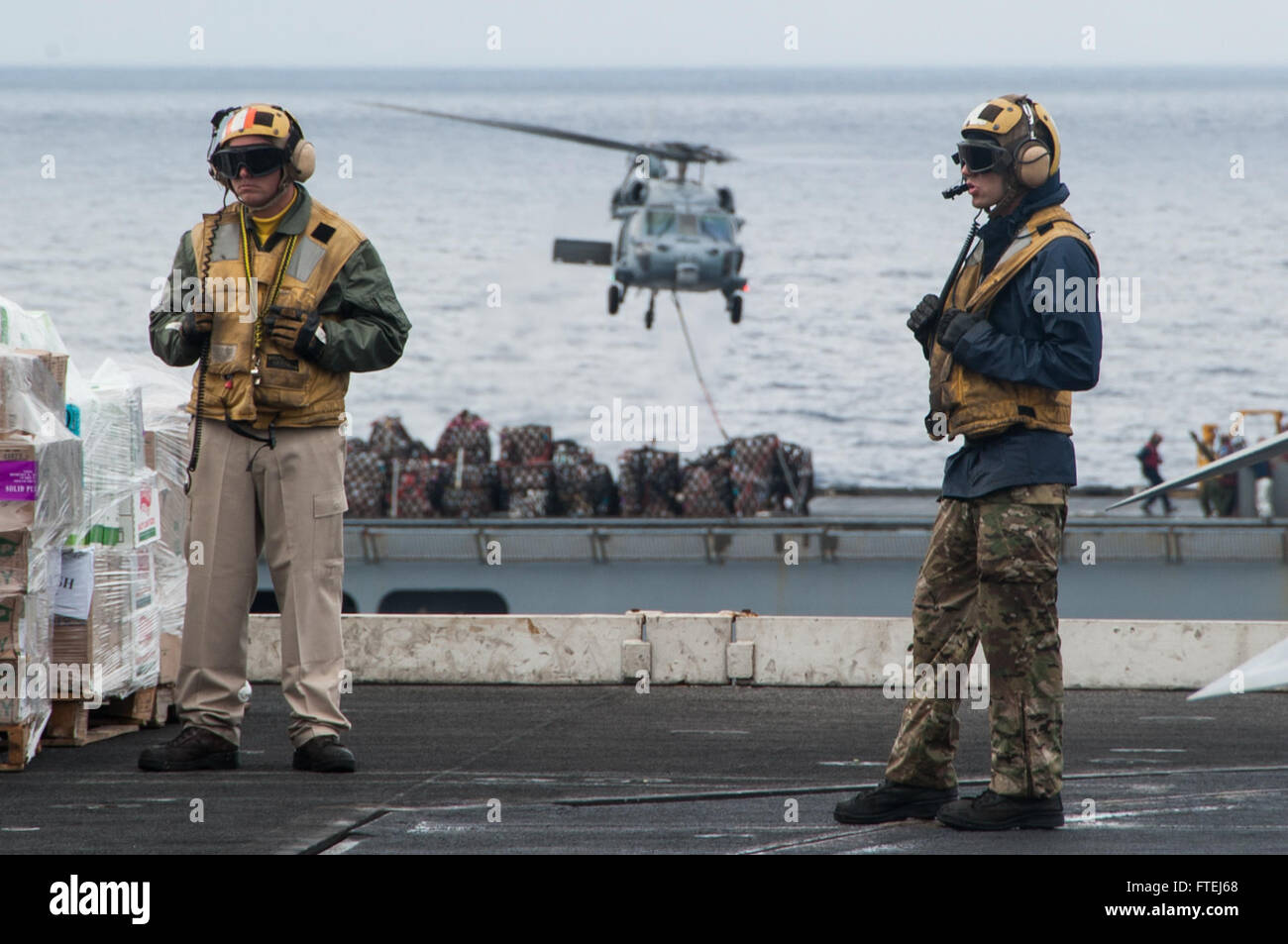 Aviation Boatswain's Mate (Handling) Chief Michael Walsh and 3rd Class ...