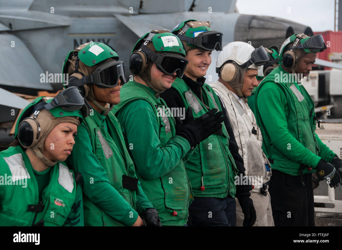 Sailors aboard the USS George H.W. Bush conduct a vertical ...