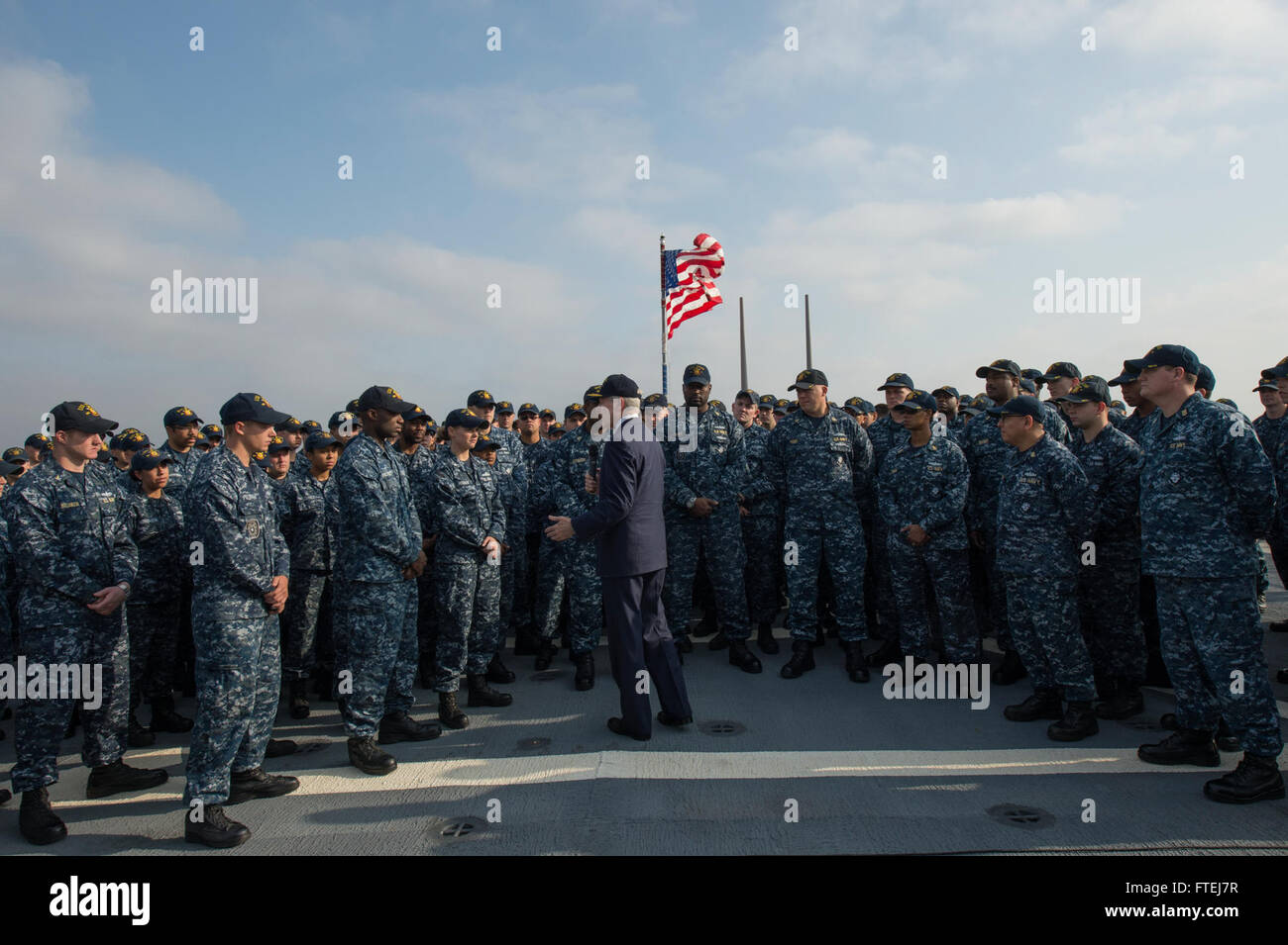 Secretary of the Navy Ray Mabus addresses sailors aboard the USS Ross ...