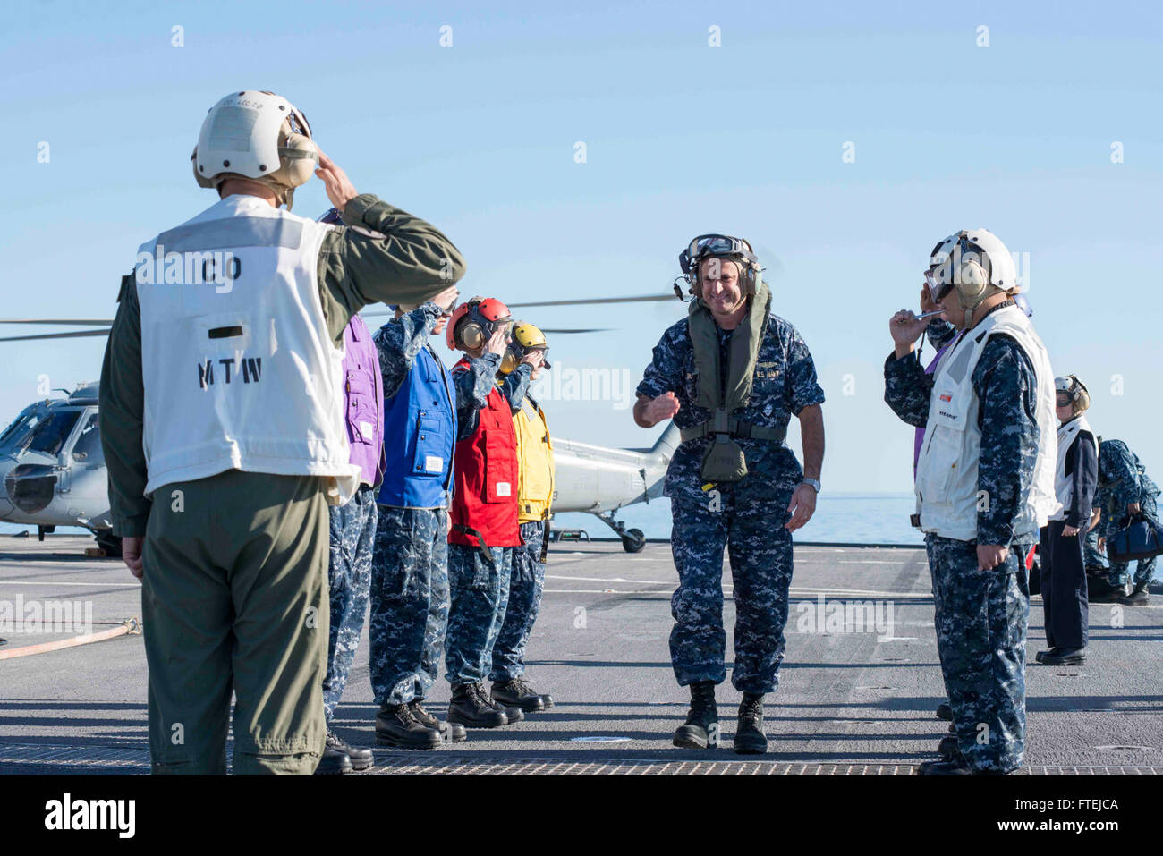 Rear Adm. Robert Burke arriving aboard the USS Mount Whitney (LCC 20 ...