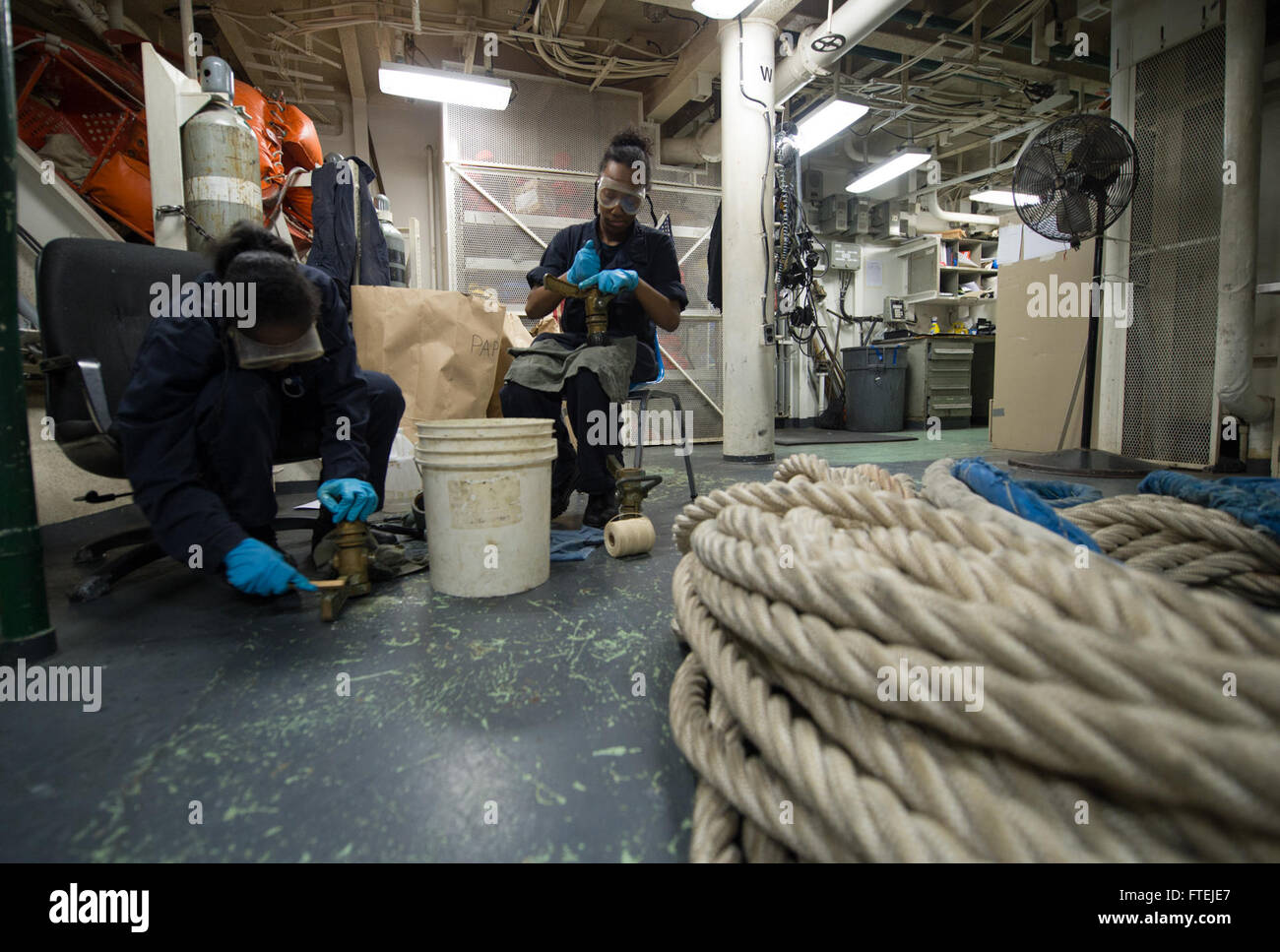 Boatswain's Mate 3rd Class Beyontee Carter and Seaman Alexis Smith ...