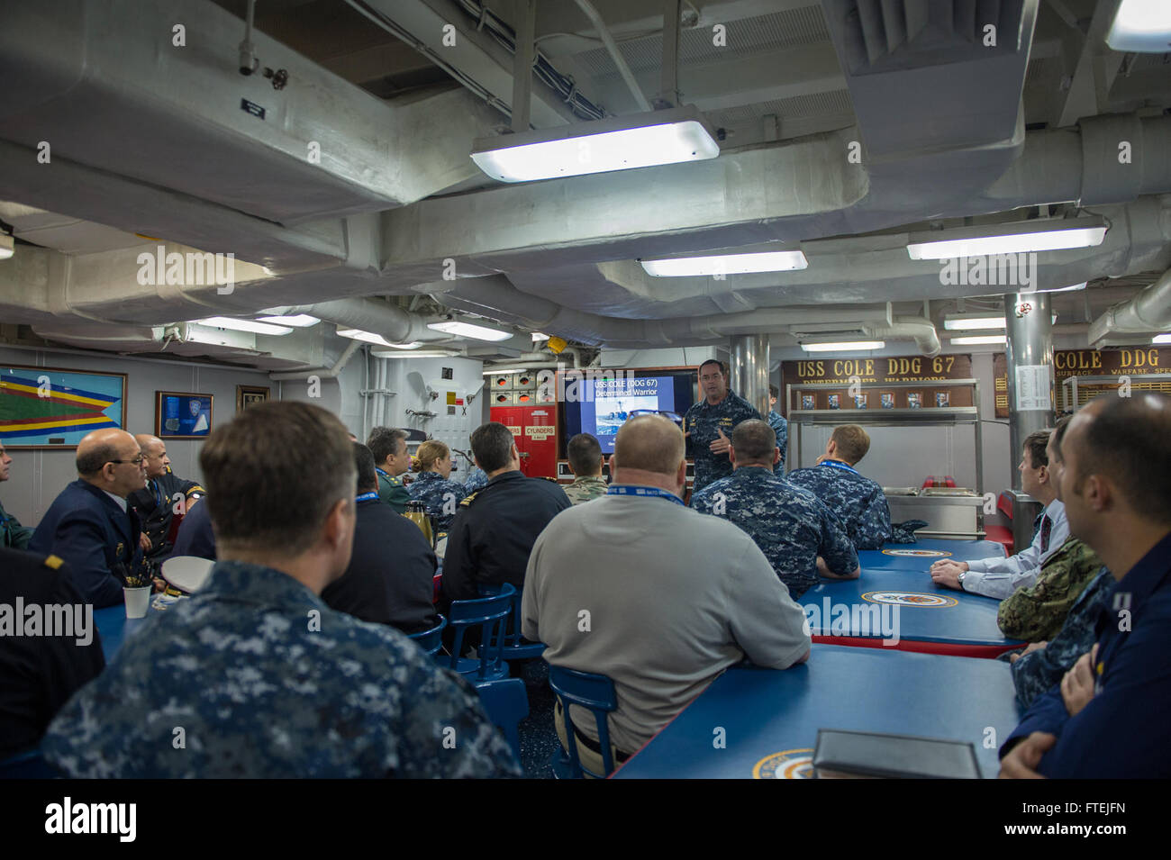 Cmdr. Dennis Farrell, commanding officer of the USS Cole (DDG 67 ...