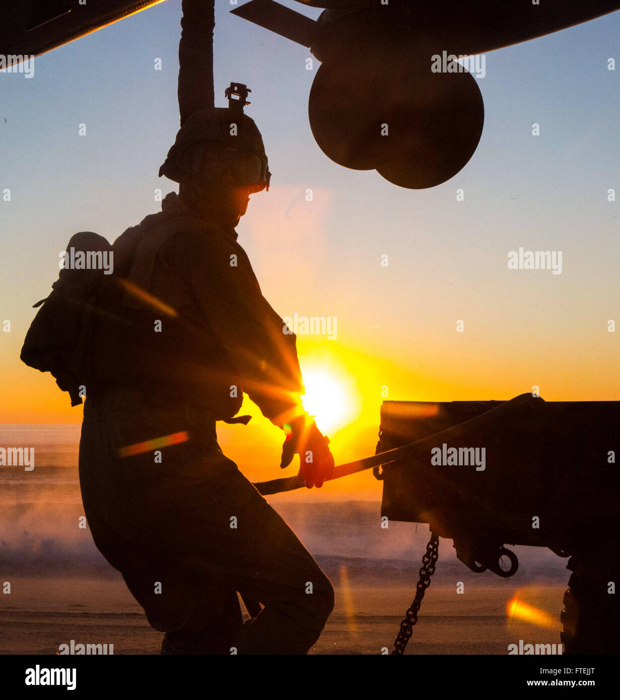 U.S. Marine Lance Cpl. Dustin Mason, part of the Landing Support ...