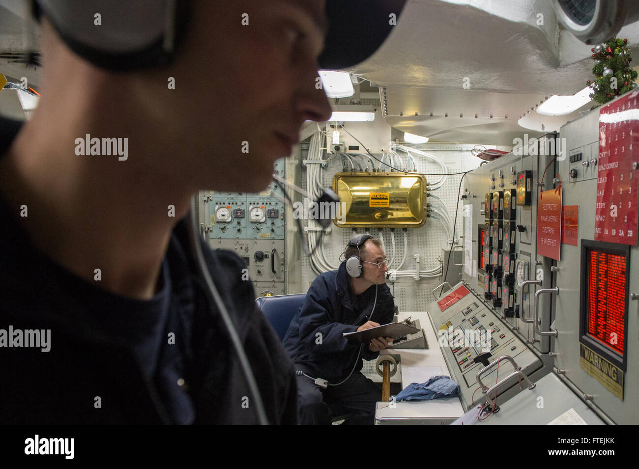 Hull Technician 1st Class James Irons aboard USS Cole (DDG 67) monitors ...