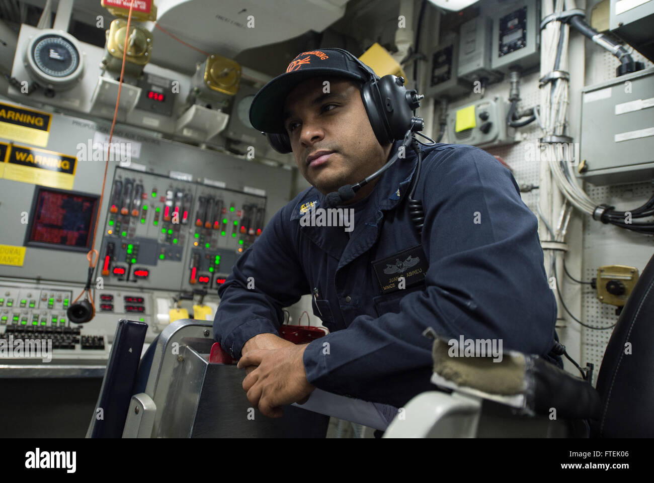 Senior Chief Machinist Mate Juan Abreu supervises an engineering drill ...