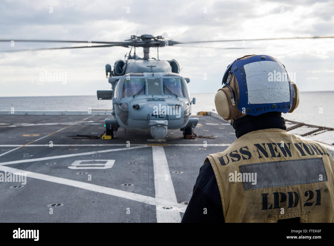 Airman Benjamin Mones, stationed aboard USS New York (LPD 21), prepares ...