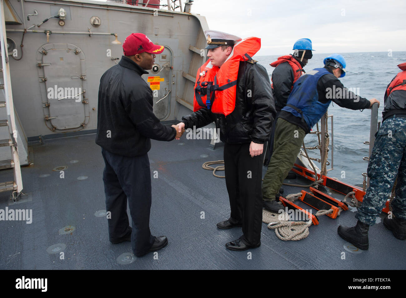 This image shows Cmdr. Timothy Moore of the USS Donald Cook (DDG 75 ...