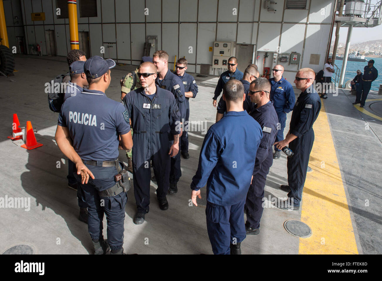 This photograph shows members of the Cabo Verde Coast Guard meeting U.S ...