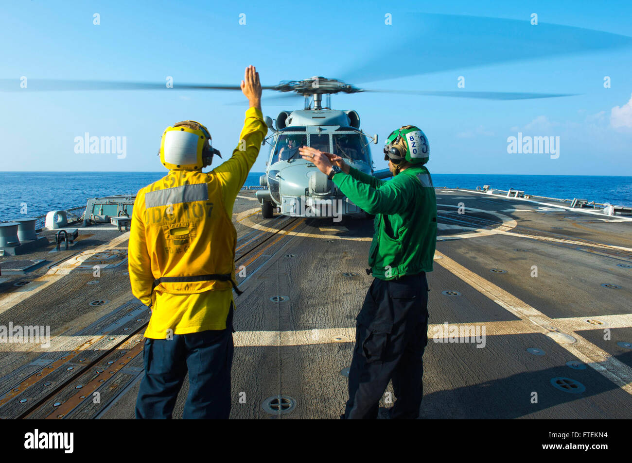 Aviation Machinist Mate 2nd Class Casey Stone transfers landing ...