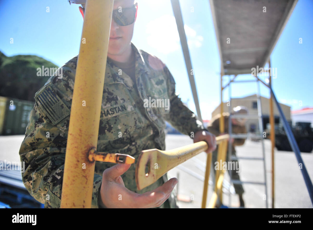 This image captures Builder 2nd Class Joshua Chastain from the U.S ...