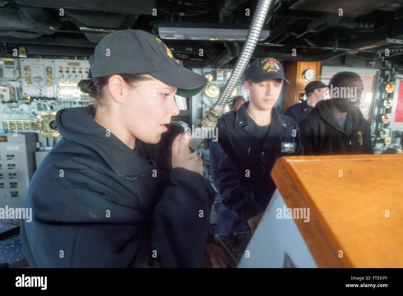 This photograph captures Fireman Samantha Stapp of the USS Cole ...