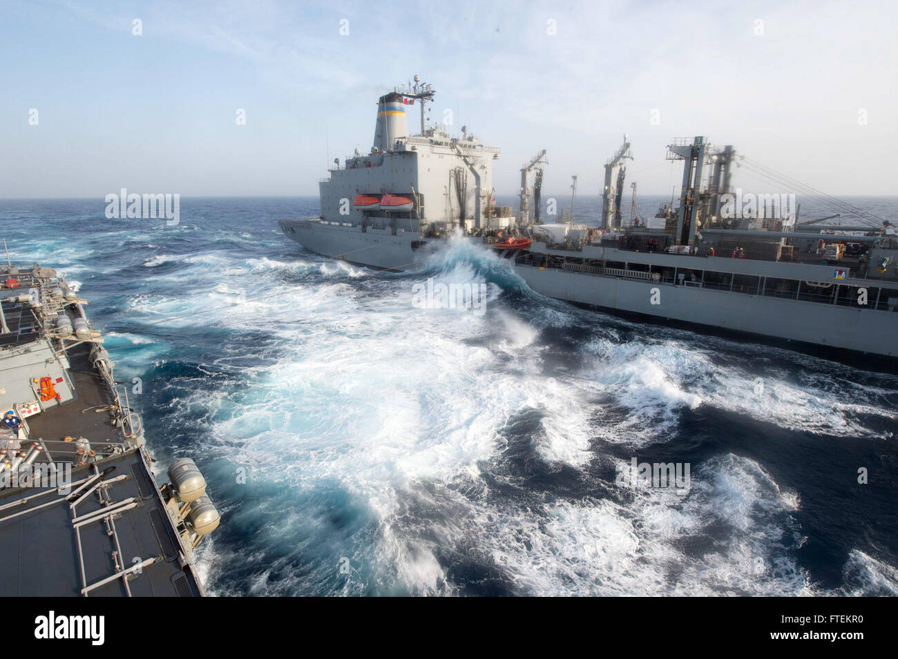 This image shows the USNS John Lenthall (T-AO 189) performing an ...