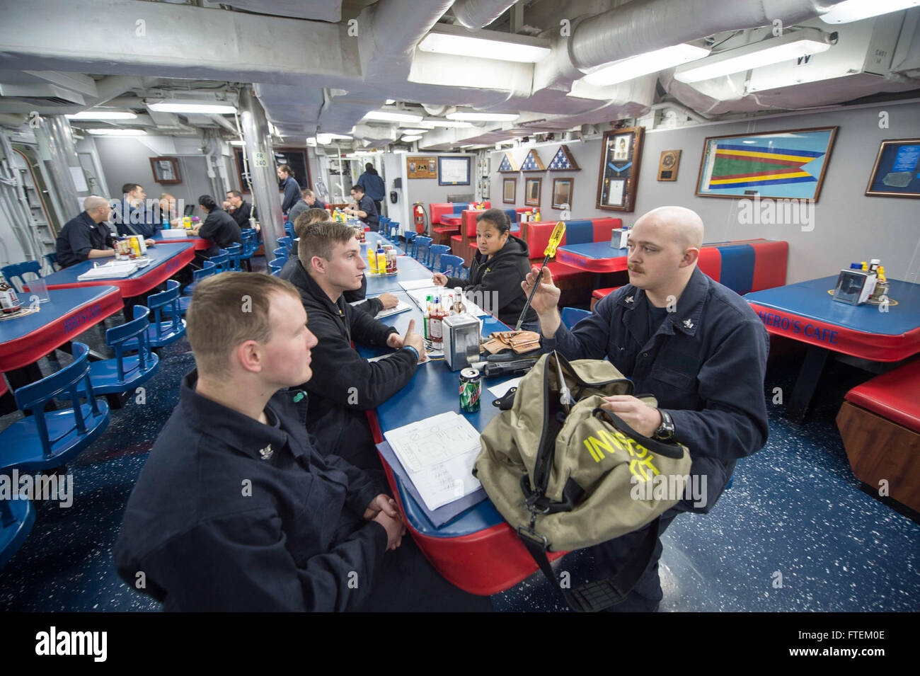 Damage Controlman 2nd Class Jeremy Key conducts training aboard the USS ...