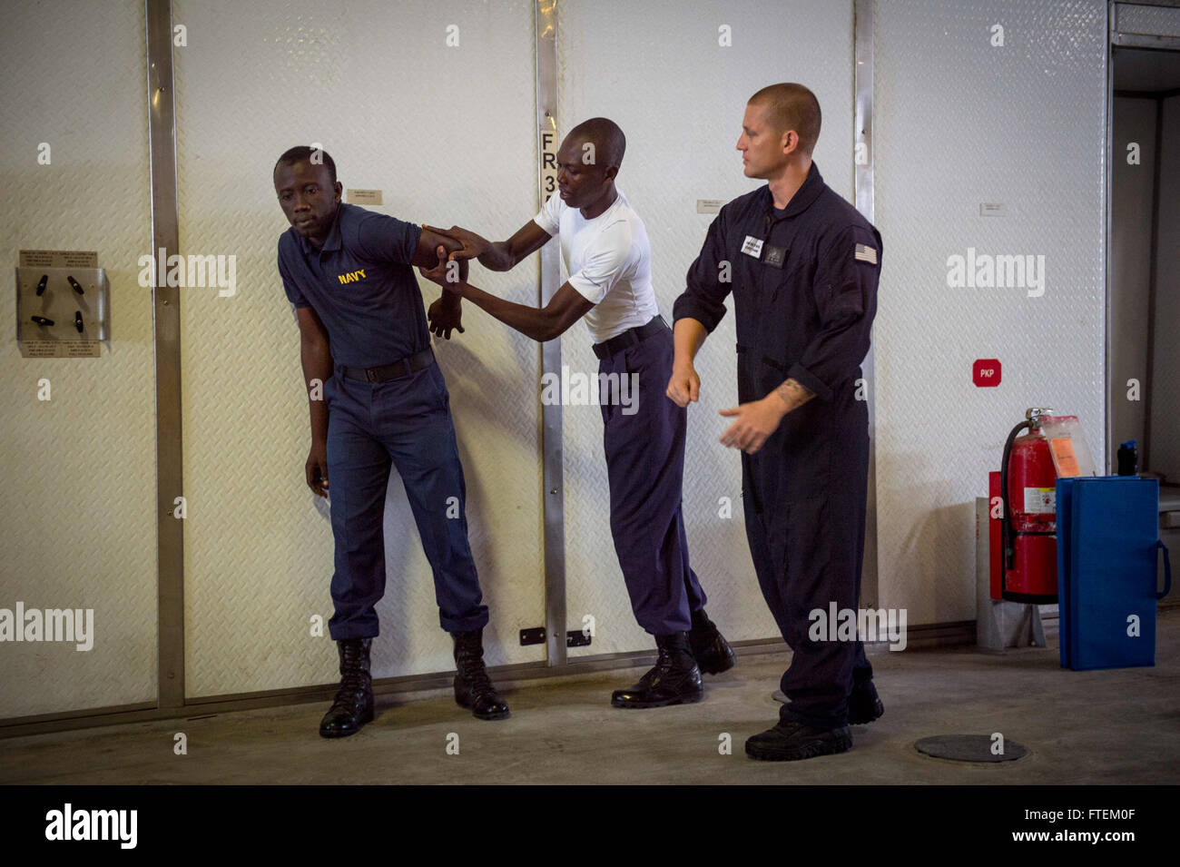 Detainee handling hi-res stock photography and images - Alamy