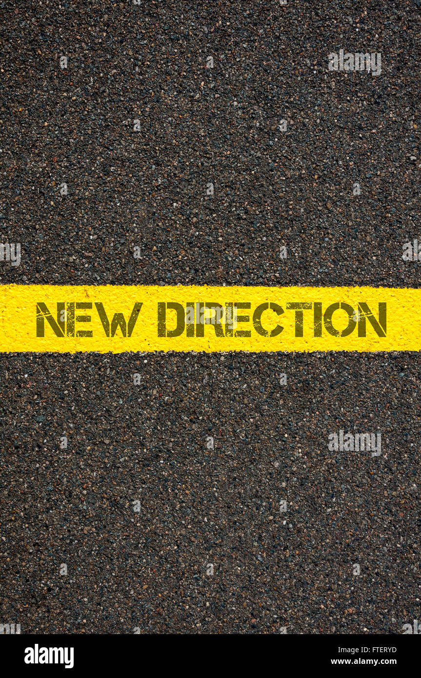 Road marking yellow paint dividing line with words NEW DIRECTION ...