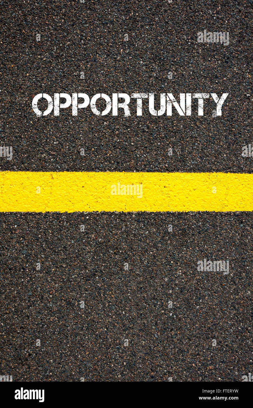 Road marking yellow paint dividing line with word OPPORTUNITY, concept ...