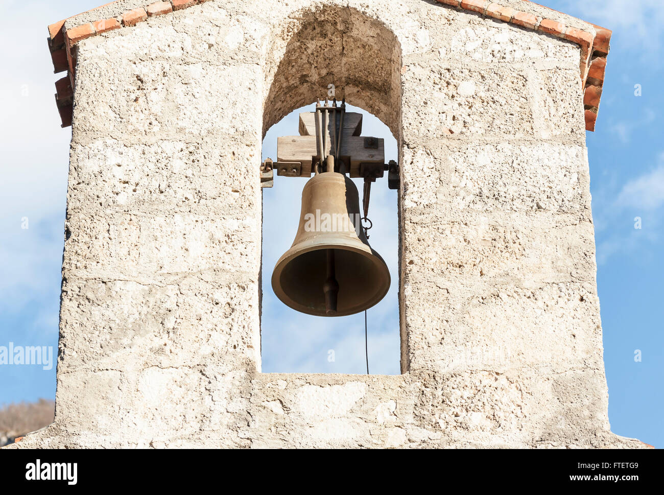 Small bell tower with a bell of a country church in the 15th century ...