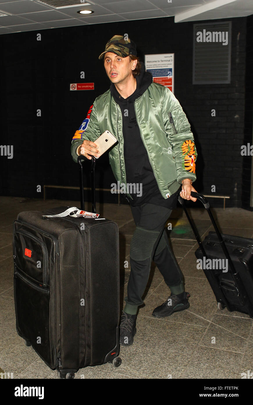 Jonathan Cheban and his girlfriend Anat Popovsky arrive at Heathrow ...