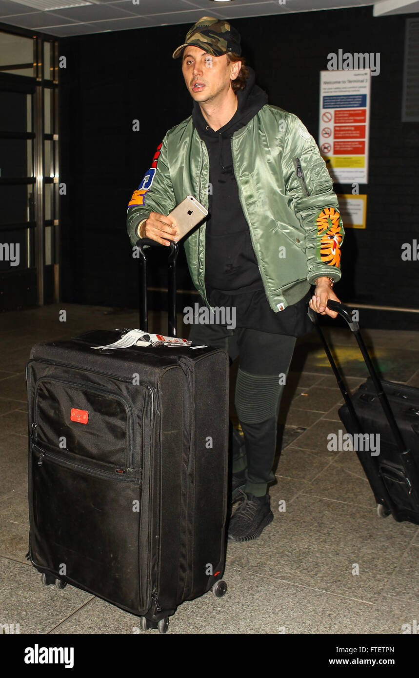 Jonathan Cheban and his girlfriend Anat Popovsky arrive at Heathrow ...