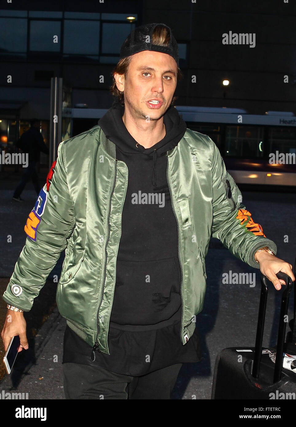 Jonathan Cheban and his girlfriend Anat Popovsky arrive at Heathrow ...