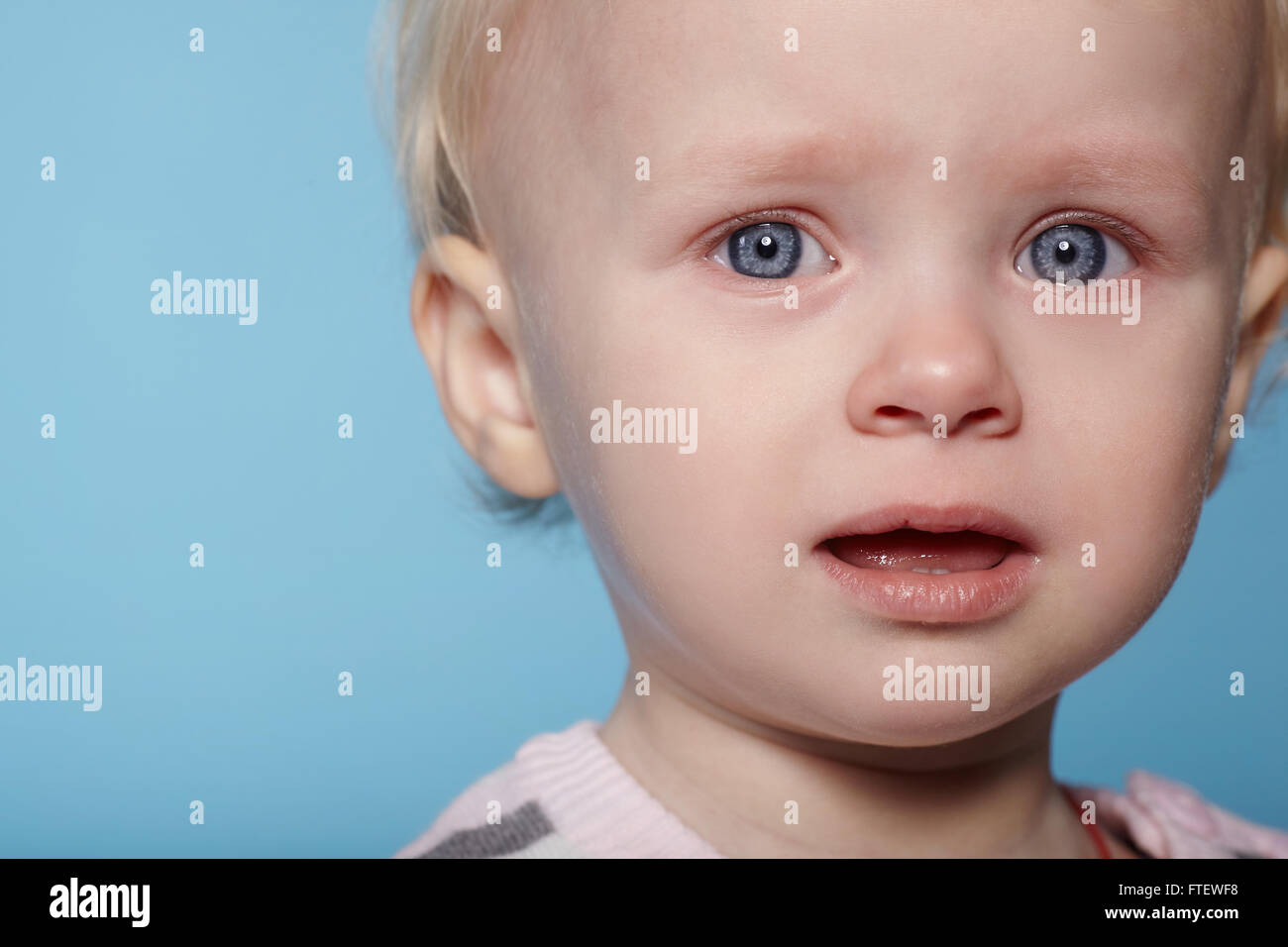 little cute child with tears on face Stock Photo - Alamy