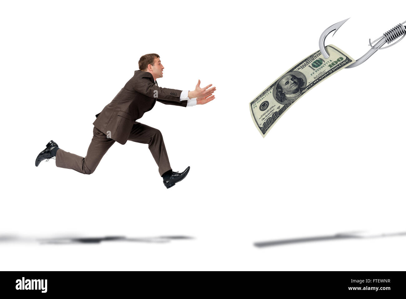 Businessman trying to catch dollar Stock Photo - Alamy