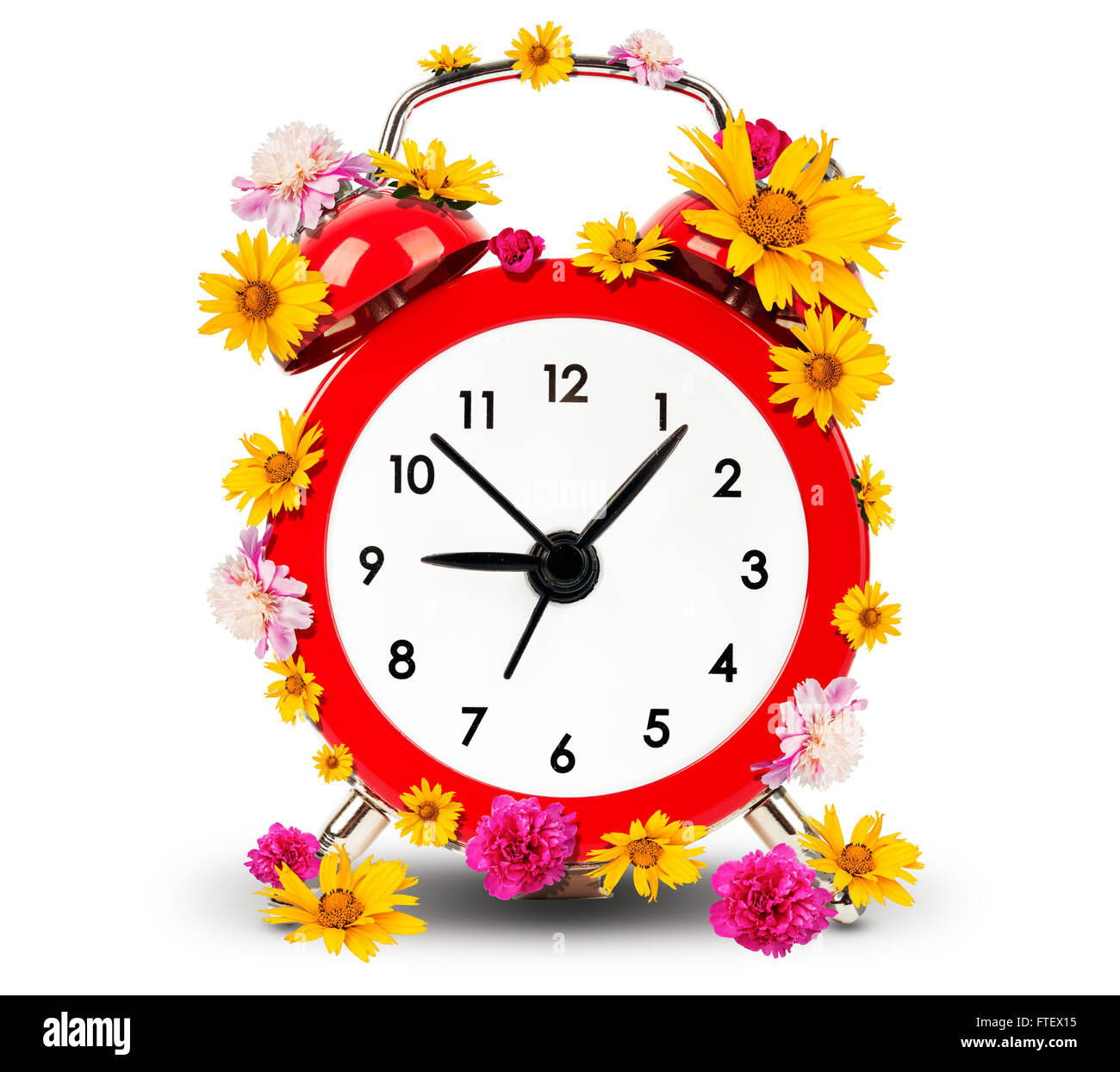 Alarm clock with flowers Stock Photo - Alamy