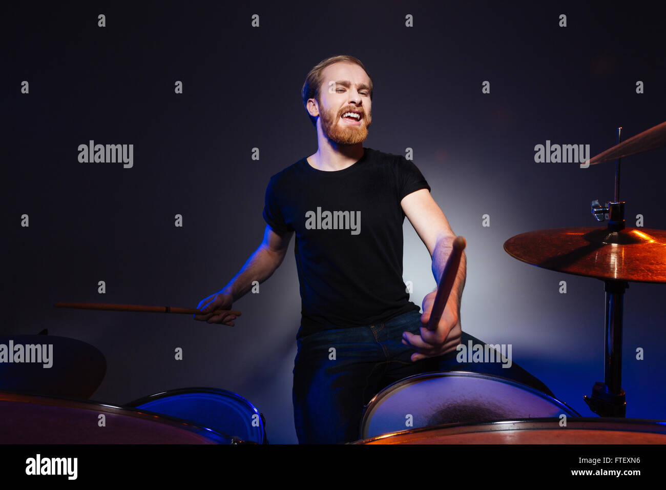 Drummer playing drums hi-res stock photography and images - Alamy