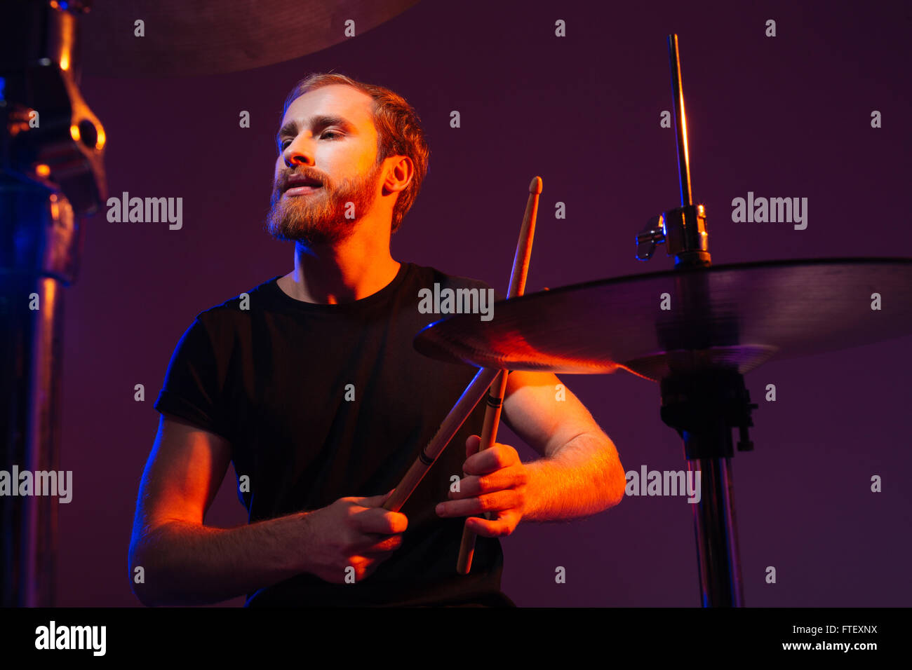 Drummer playing drums hi-res stock photography and images - Alamy