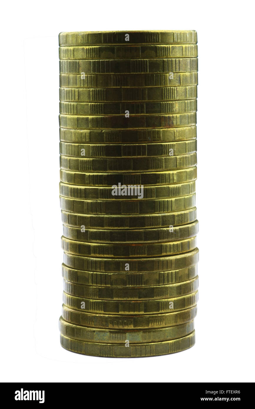 Column of coins isolated on white background Stock Photo - Alamy
