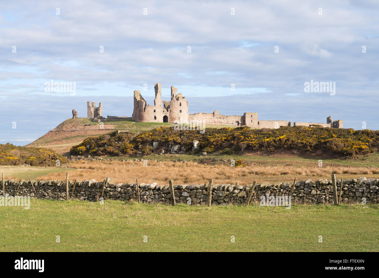 Dunstanburgh Castle seen from the south, Northumberland, England, UK ...