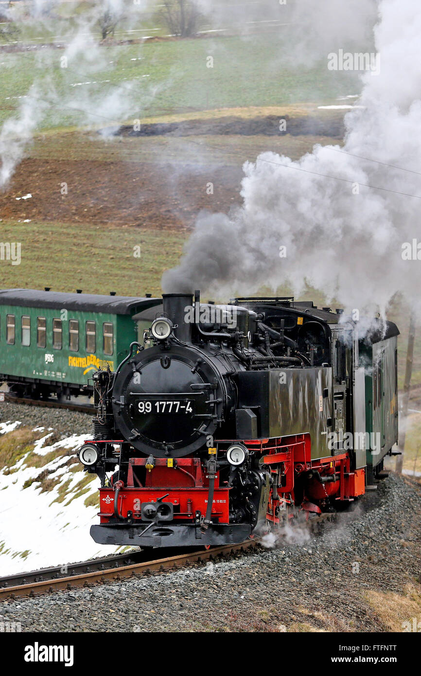 The Fichtelberg mountain railway going uphill from Cranzahl towards ...