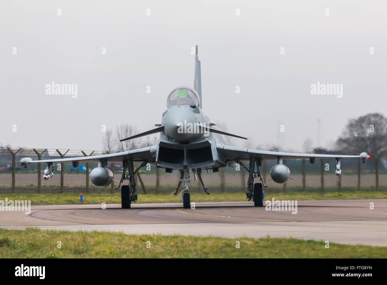 A Typhoon fighter jet face on with the camera as it approaches the ...